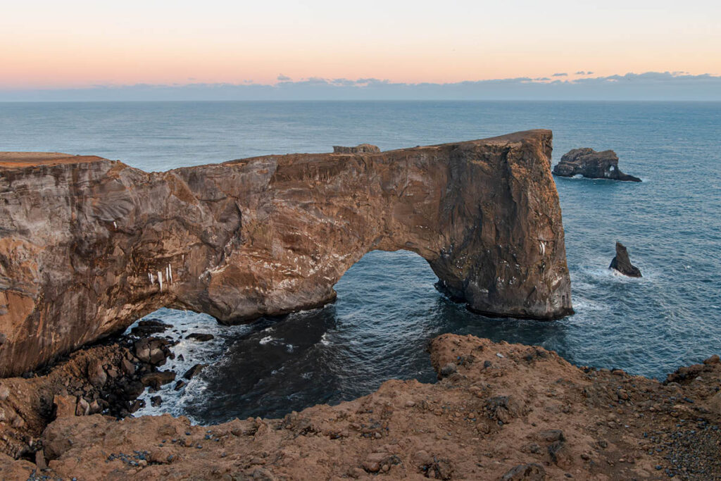 Dyrhólaey Arch: Nature's Majestic Gate - BusTravel Iceland